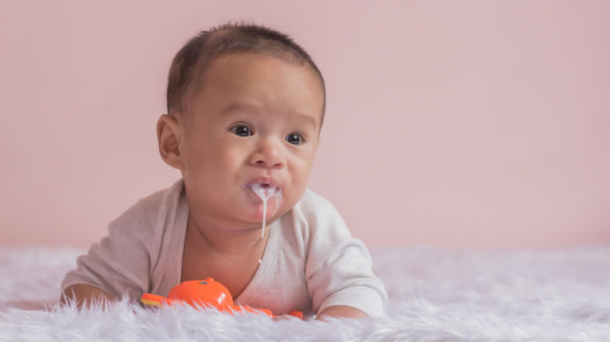Why Do Babies Spit Up and How to Reduce It? - Mom With Vibe